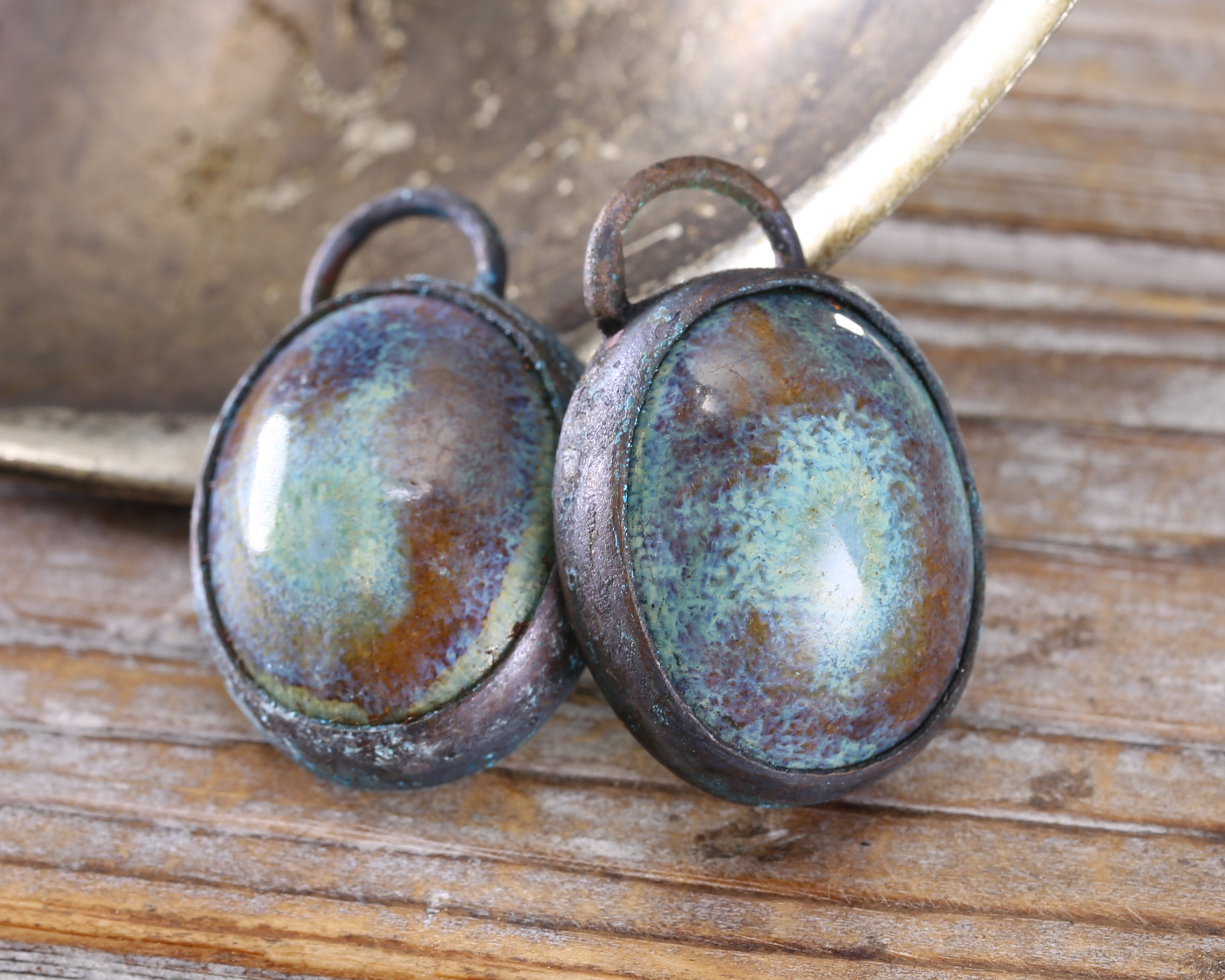 Gaea Ceramic Magical Mist Oval set in Antique Copper Bezel 28-30x18-19mm