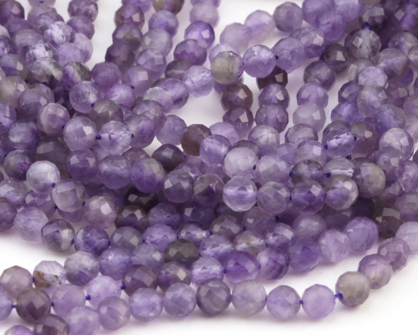 Dogtooth Amethyst (light) Faceted Round 4mm